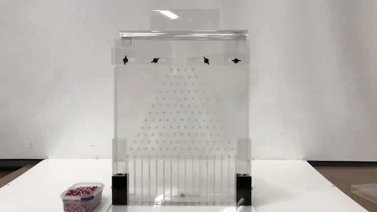 1A20.10 - Slo-Mo - Gaussian Probability Curve - Bell Curve - Galton Board